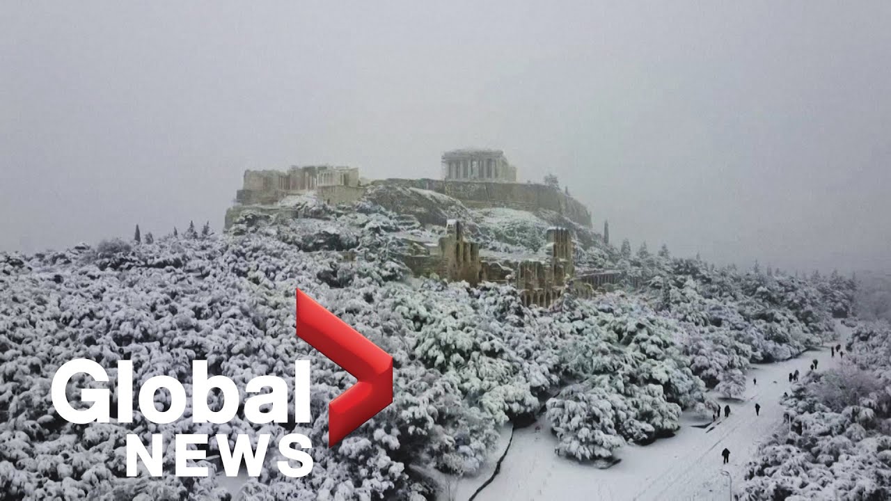 Snow blankets Athens Acropolis as rare storm hits Greek capital - YouTube