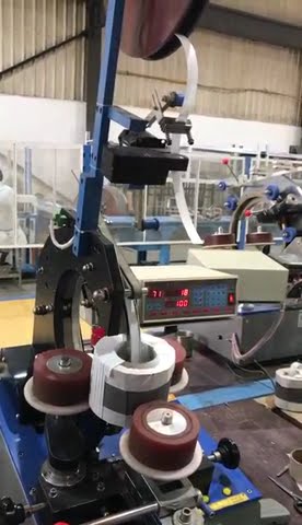 Automatic insulation tape machine - YouTube
