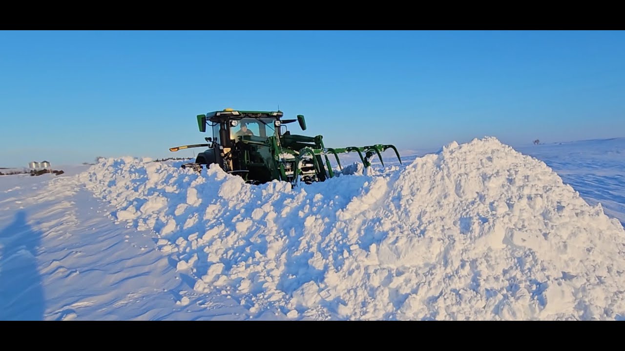 John Deere Pushing 12 Feet Of Snow - YouTube
