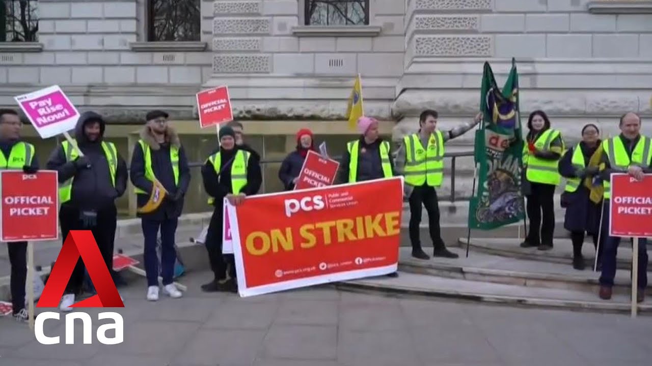 Half a million workers go on strike in UK over pay, working conditions ...