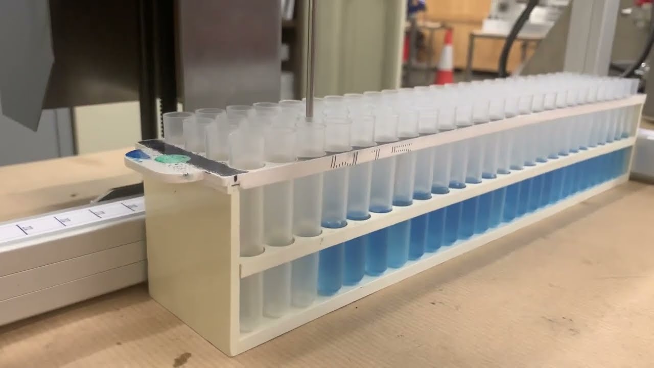 Accuramatic Peristaltic Pump & XYZ Distributor Filling Test Tubes - YouTube