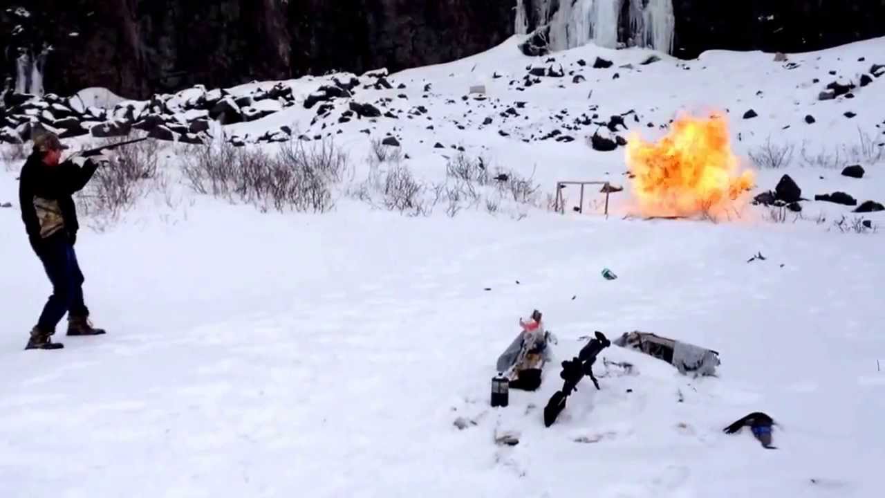 Shooting a propane tank with a 12 gage buck shot - YouTube
