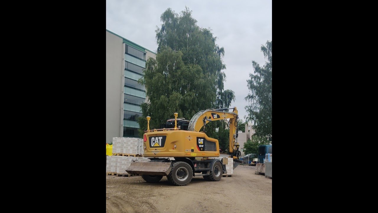 CAT M314F + engcon tiltrotator construction site part21 - YouTube