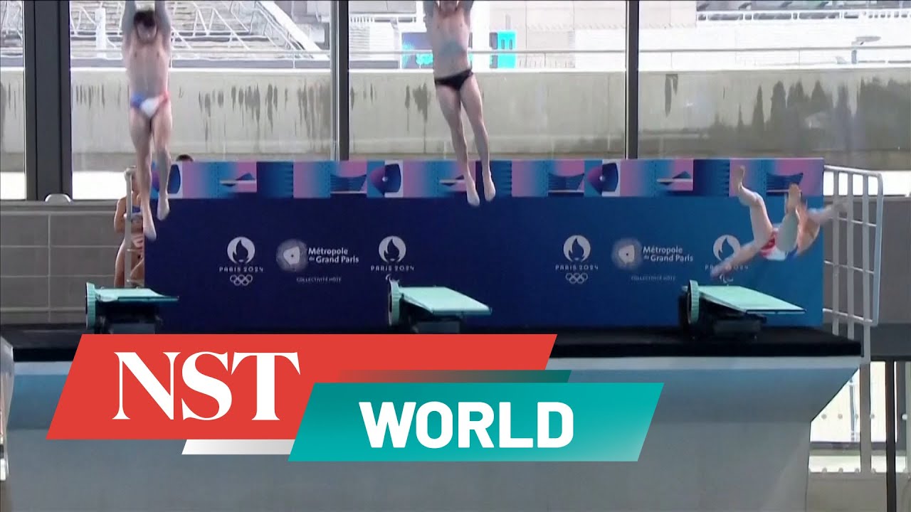 Faux splash! Diver slips during Olympic pool inauguration ceremony ...