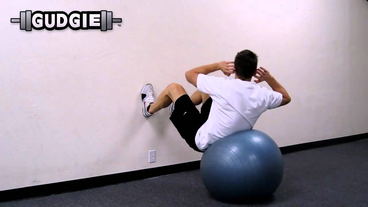Ball crunch feet on wall twist (Gudgie) - YouTube
