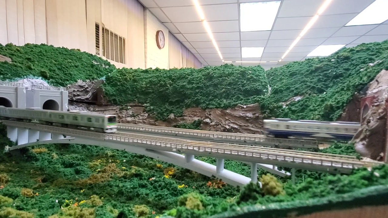n scale train in mountain - YouTube