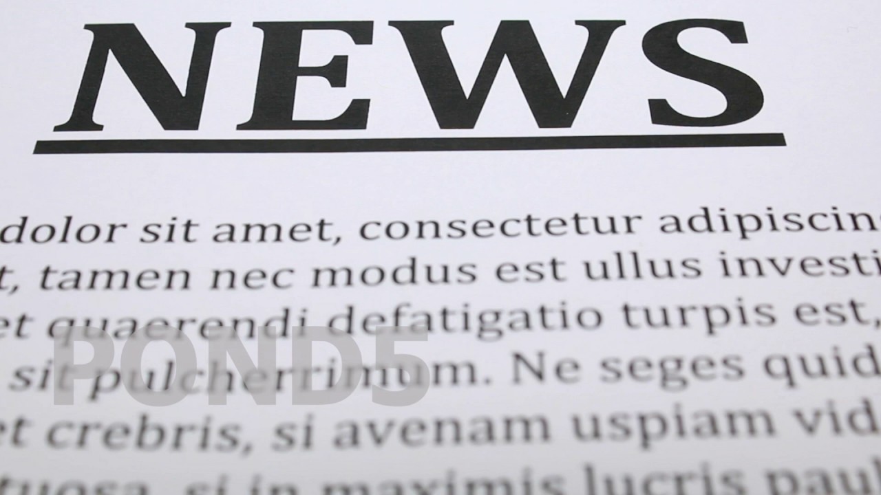 News paper rolling up the screen and into focus - YouTube