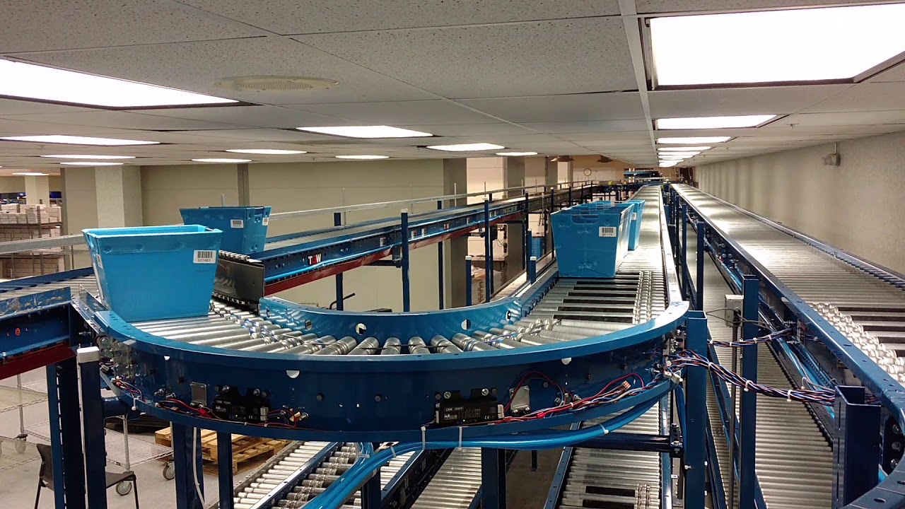 Tote orientation change using MDR speed changes thru curve - YouTube