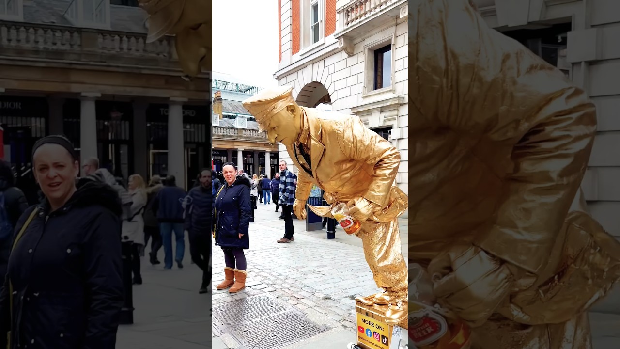 How gold man statue seating on nothing works to entertain his audience ...