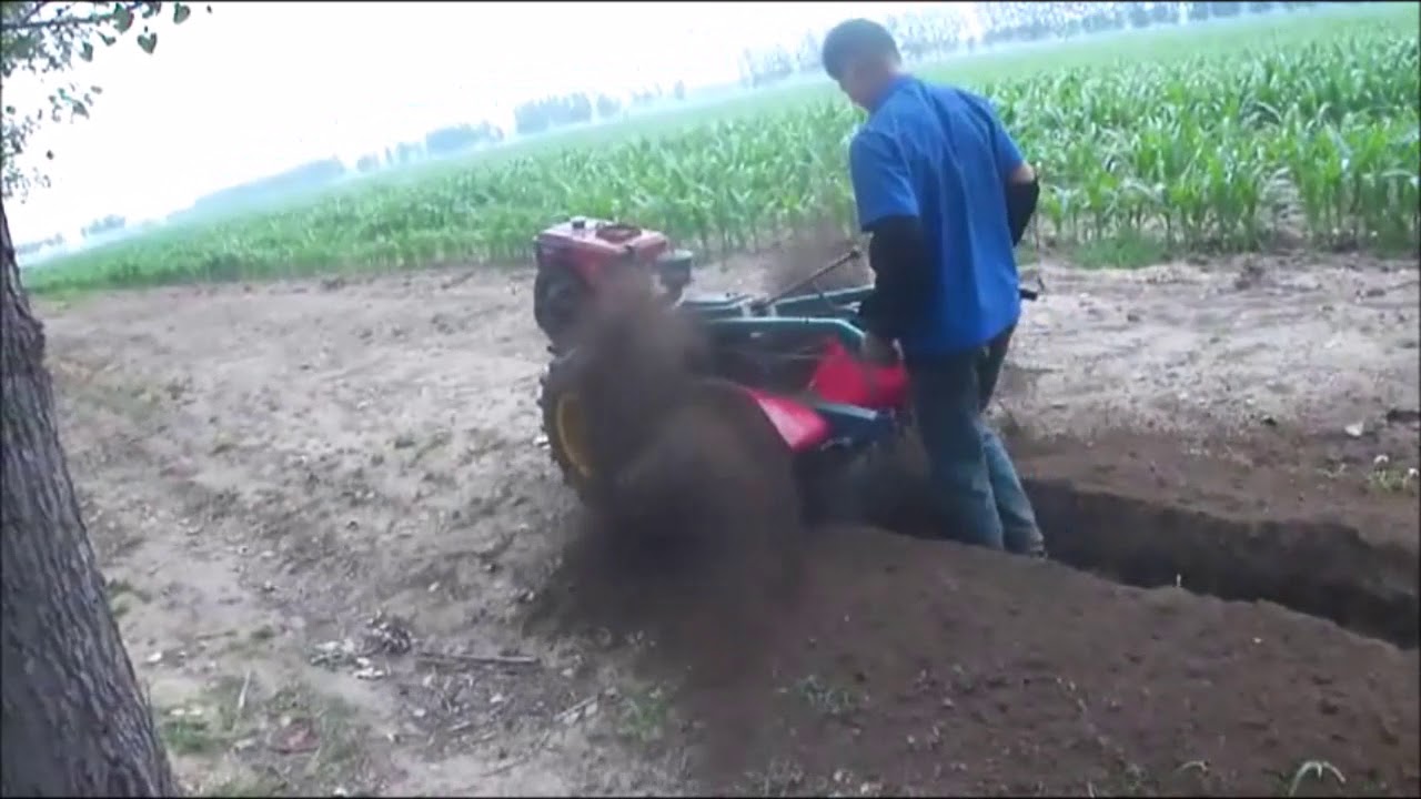 Tillers4africa Ditcher for two wheel tractor - YouTube