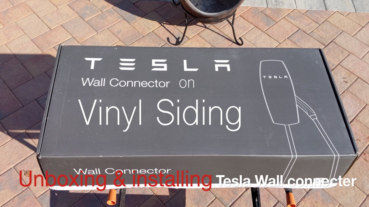 Unboxing and installing a Tesla Wall connecter outside on Vinyl Siding ...