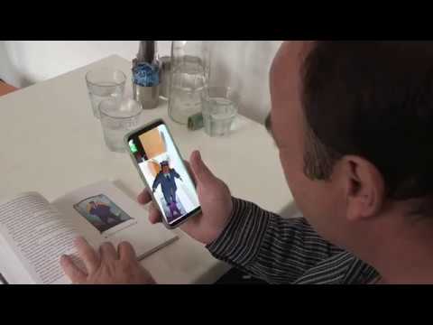 Tim Raby (Officer Harrison in our game 'Zingoshi') trying out the AR in ...