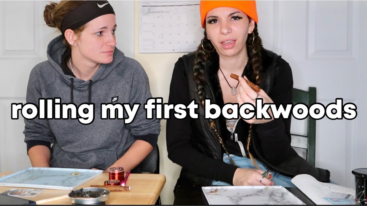 BEGINNER ROLLS A BLUNT : rolling my first backwoods - YouTube