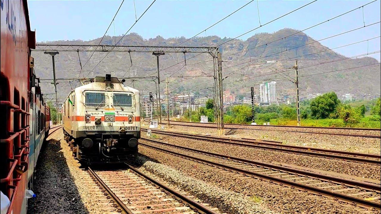 Train 16345 LTT Mumbai Thiruvananthapuram Netravati Express Train Crossing - YouTube