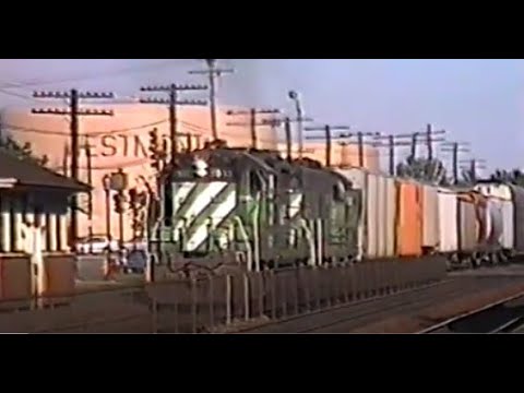 BN/Metra 1990. Geeps, E9 at Westmont. side-by-side in Western Springs ...