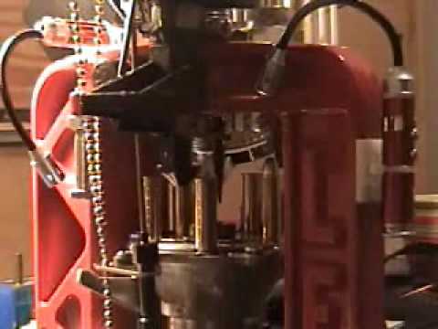 Mike's Lee bullet feeder operation on the Load Master.wmv - YouTube