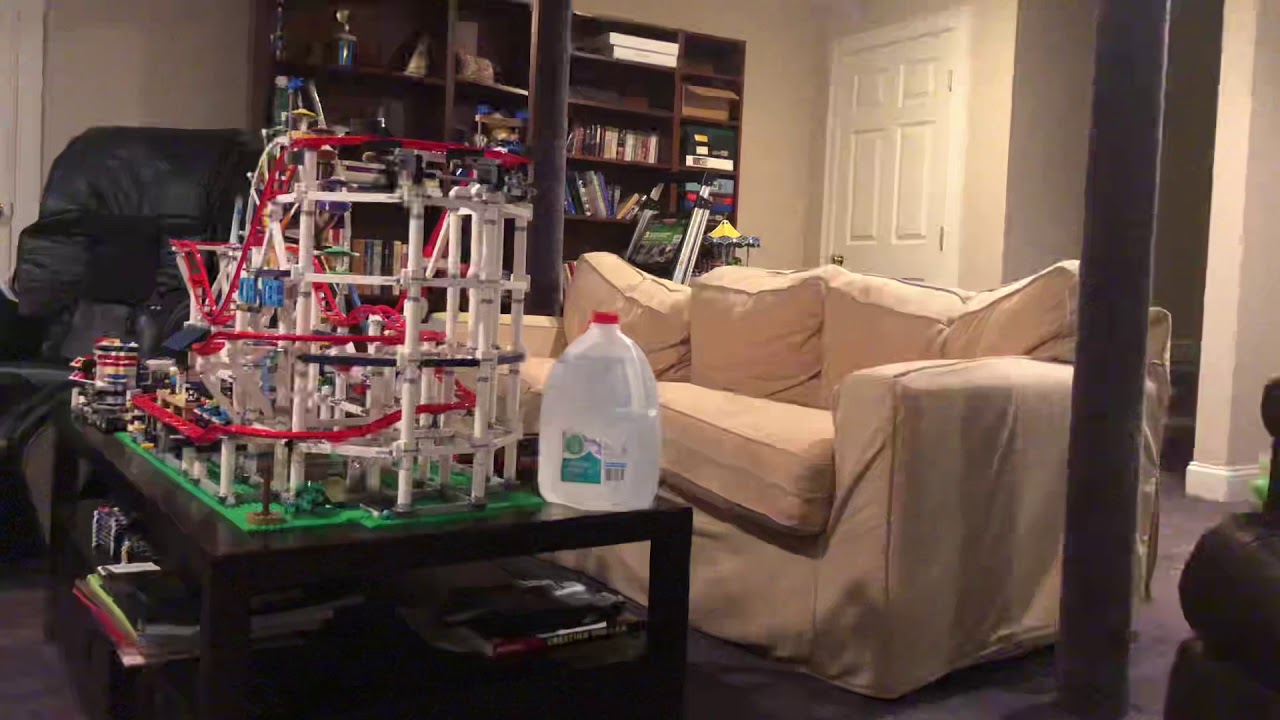 Togo playing with green alien toy - YouTube