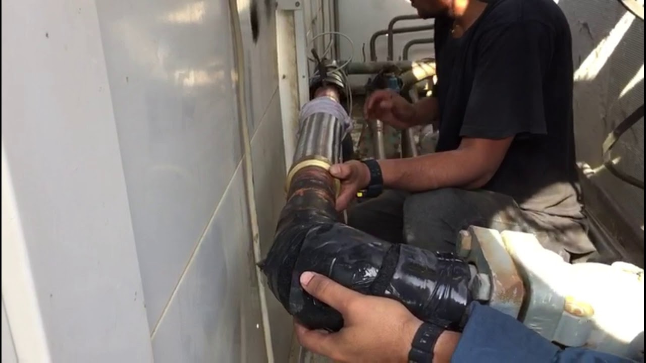 Installing new vibration absorber suction line for 50 ton compressor ...