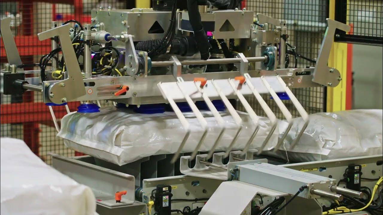 Robotic Palletizing for Boxes & Bags of Glue Beads by Pearson Packaging Systems - YouTube