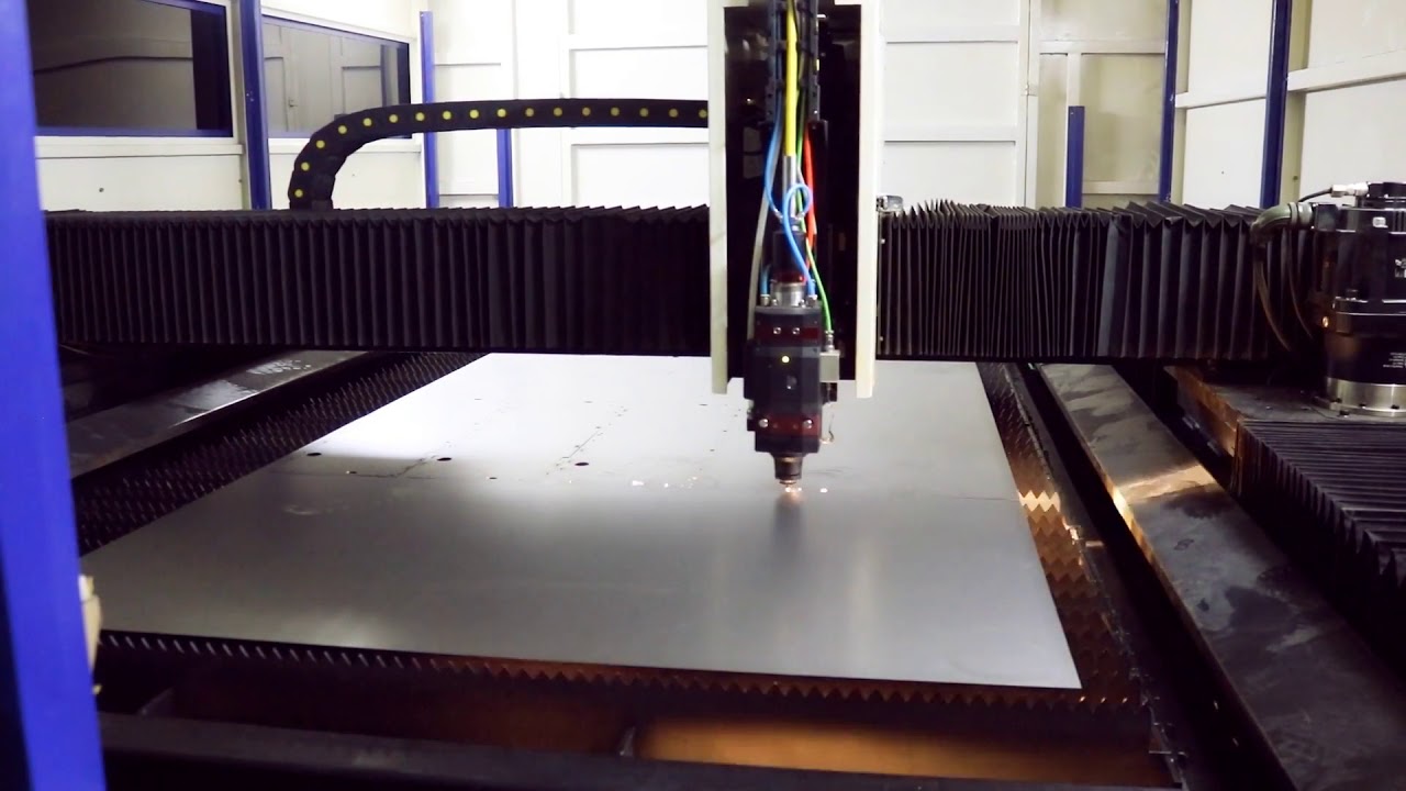 Laser cutting machine with sheet loading and unloading system - YouTube