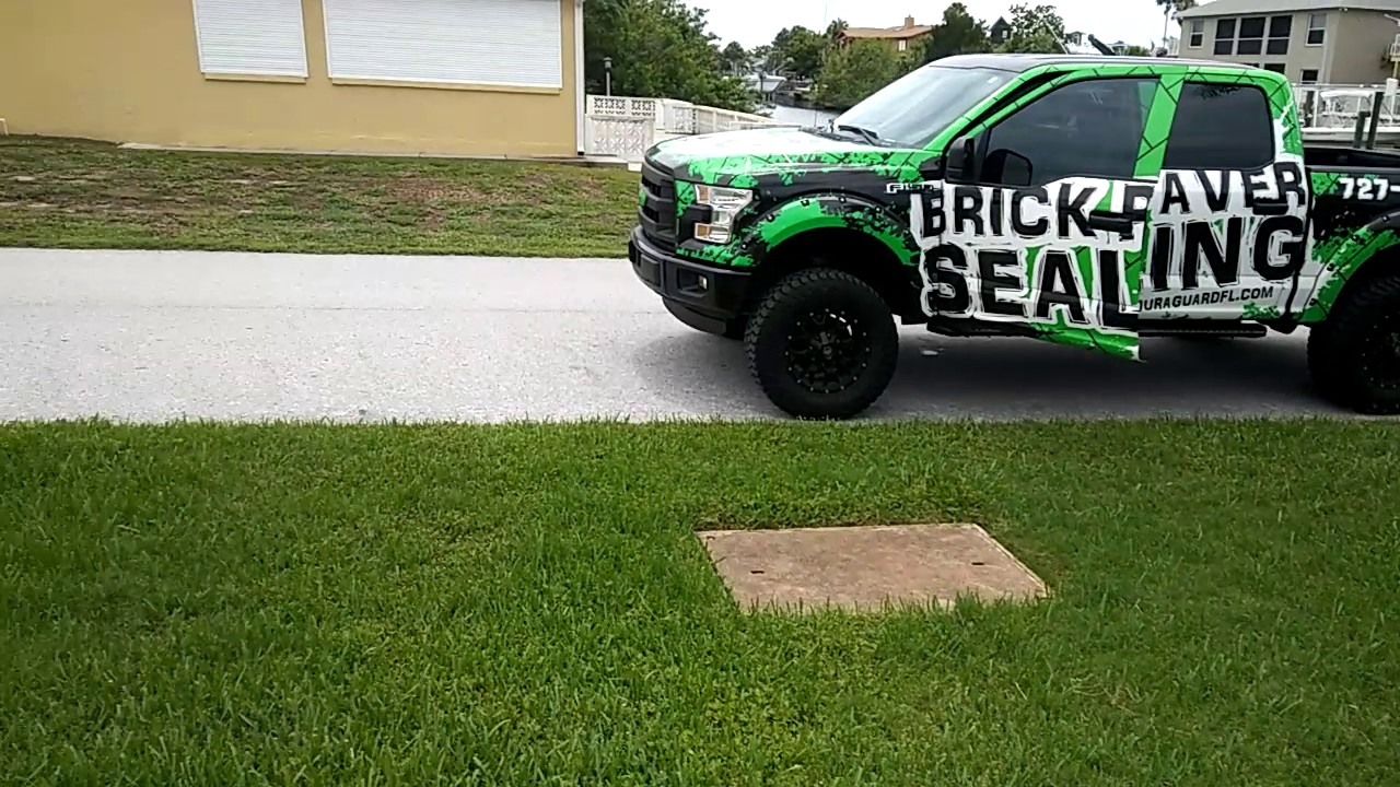 Time to strip another bad paver sealing job. - YouTube
