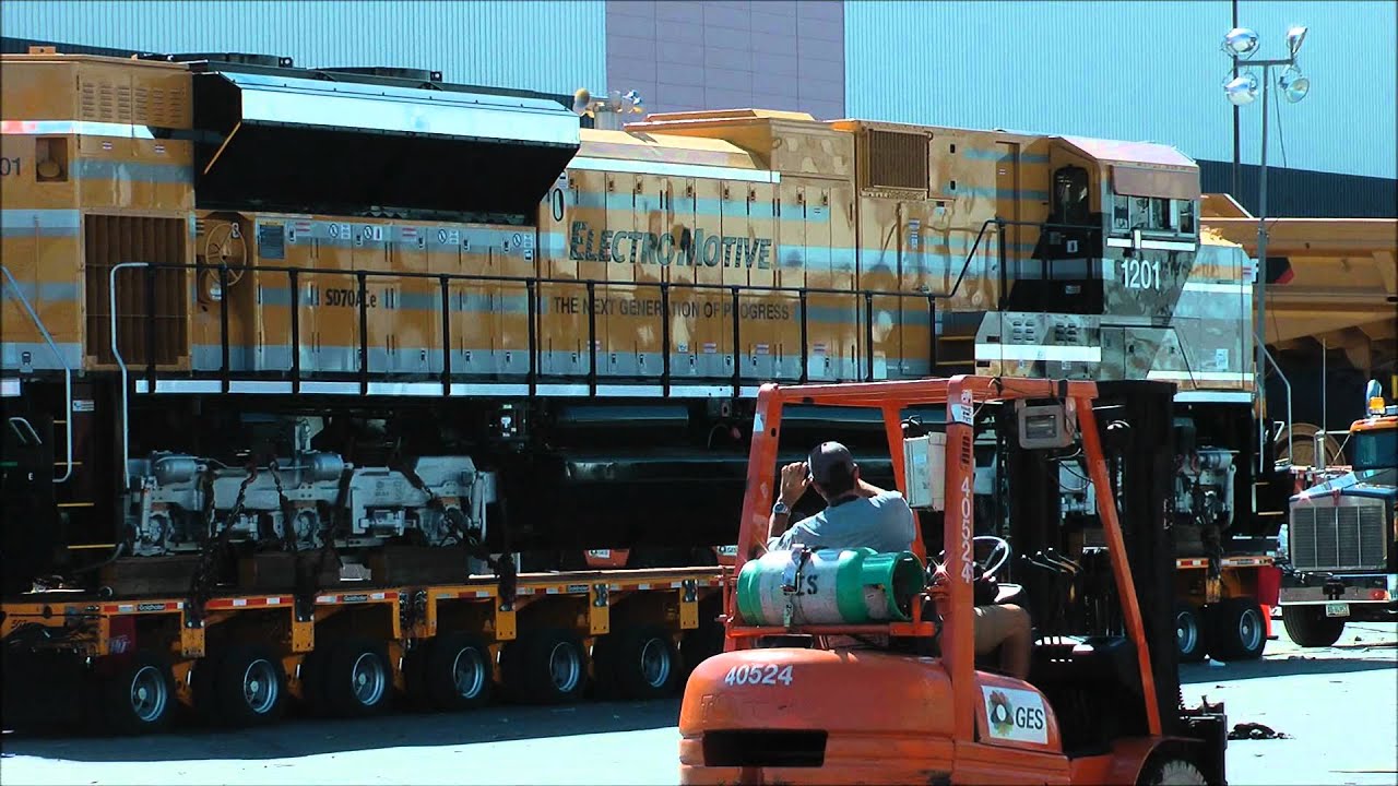 Caterpillar Electro - motive train being moved by road - YouTube