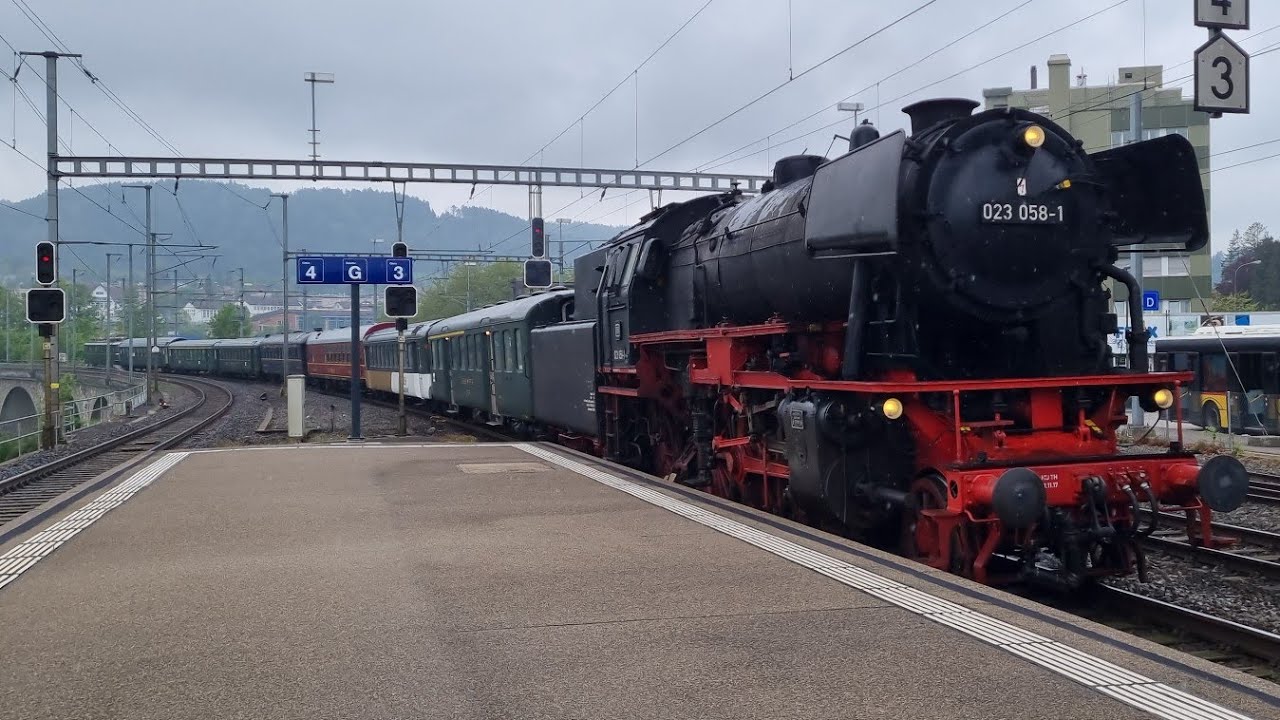 EV BR 23 058 mit Komp durchfahrt in Uzwil - YouTube