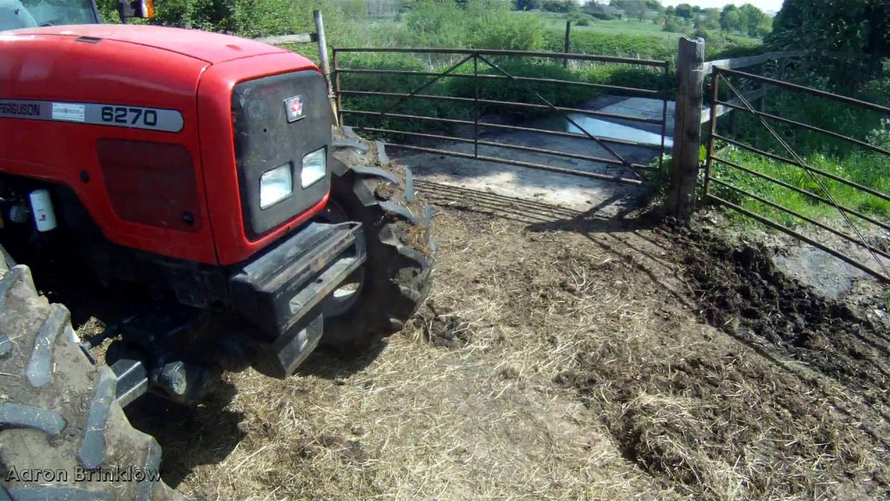 Taking Some Muck out to the Heap. - YouTube