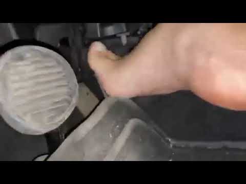 Cranking car with large floor mounted gaspedal with bare foot