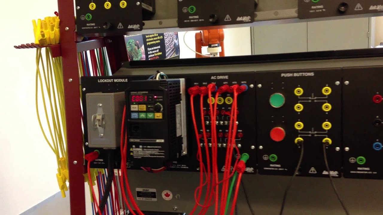 Omron sysdrive pushbutton DC braking with a 3 phase AC motor - YouTube