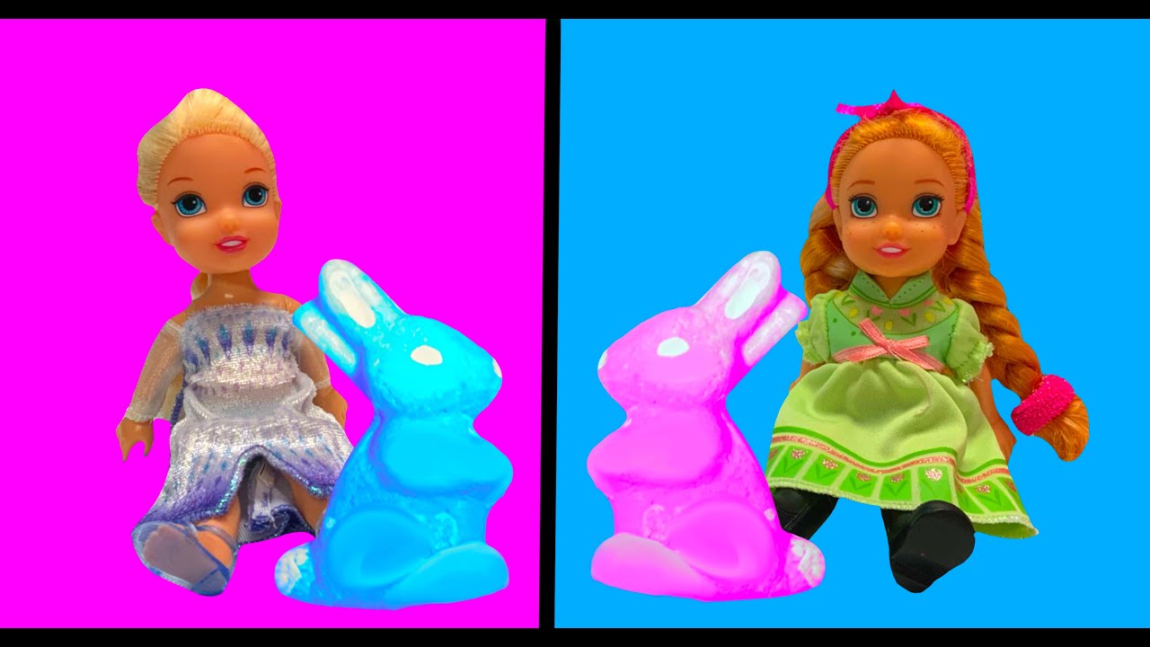 Elsa and Anna toddlers decorate Easter bunnies - YouTube