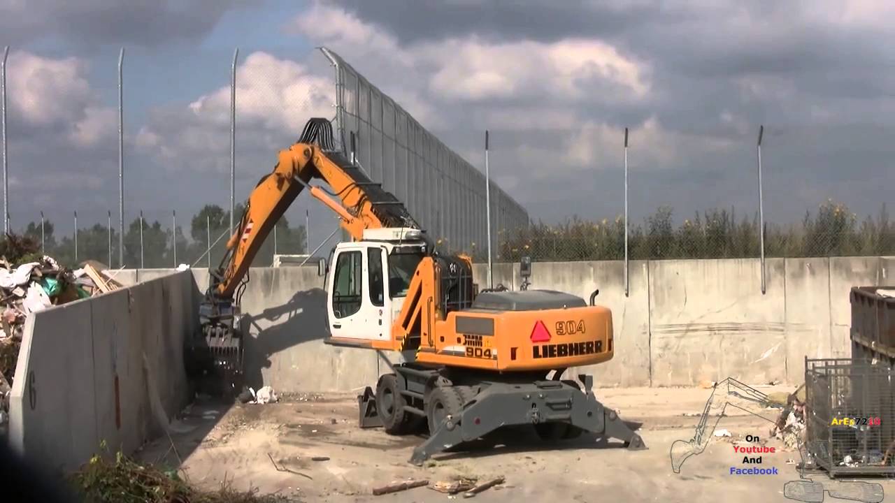 Liebherr A904C with universal grab ARDEN S- sorting waste in Denmark ...