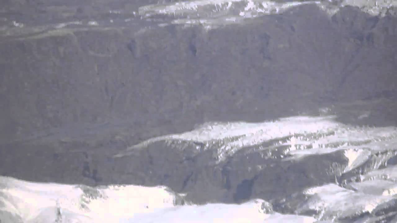 Flying over an active volcano - YouTube