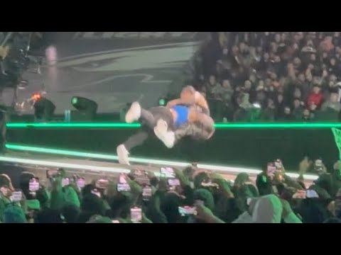 Jey Uso spears Jimmy USO off the stage during Cody Rhodes Roman Reigns ...