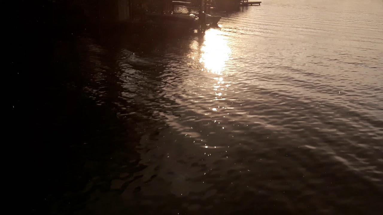 Raining With The Sun Out On A Lake - YouTube
