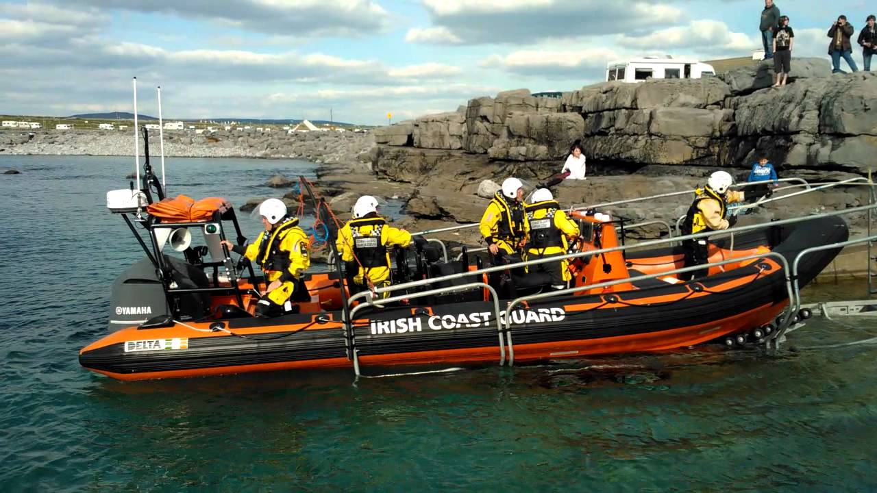 Doolin Coastguard launch and dolphin at Doolin pier.mp4 - YouTube