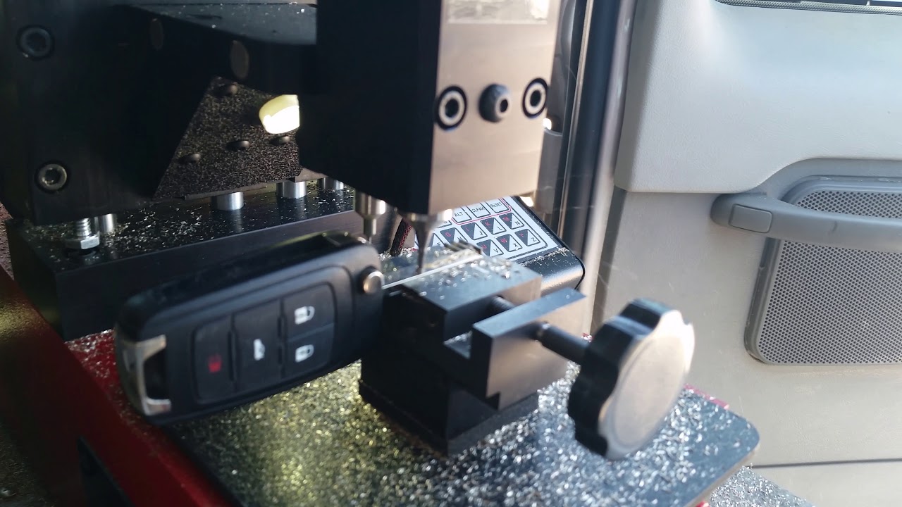 2 laser key cutters - YouTube