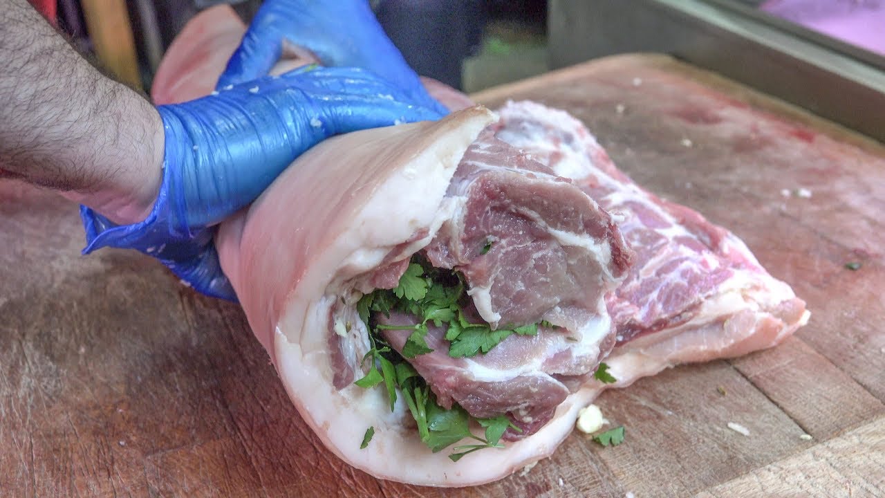 Stuffed Fat Pork Belly the Italian Way. Preparing "Porchetta". London ...