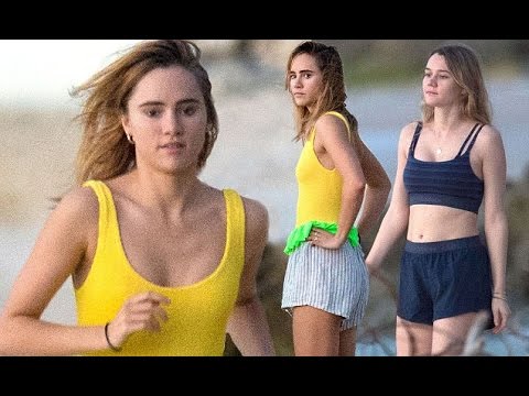 Suki Waterhouse in vibrant yellow swimsuit joins bikini clad sister Immy for family break to Barbado