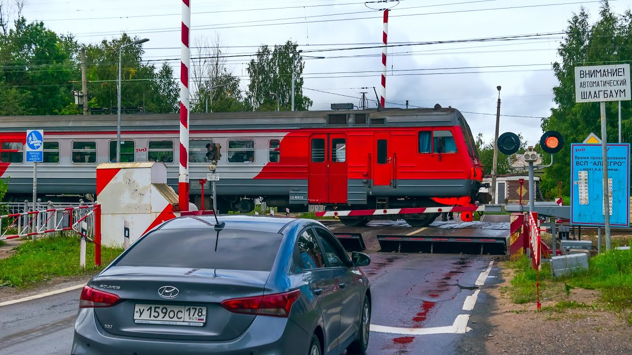 RailWay. Russian railroad crossing. Commuter EMU train ED4M ...