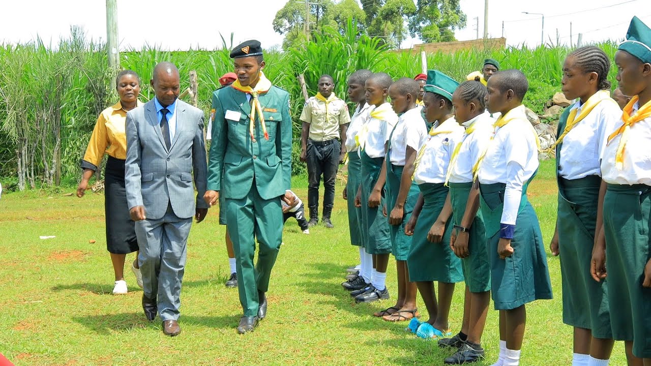 See how Pastor Matara matching and inspected pathfinders parade - YouTube