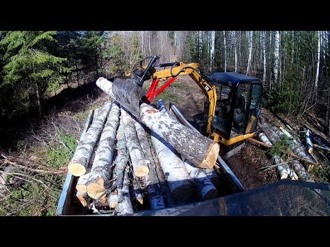 Moving logs out of the forest. - YouTube