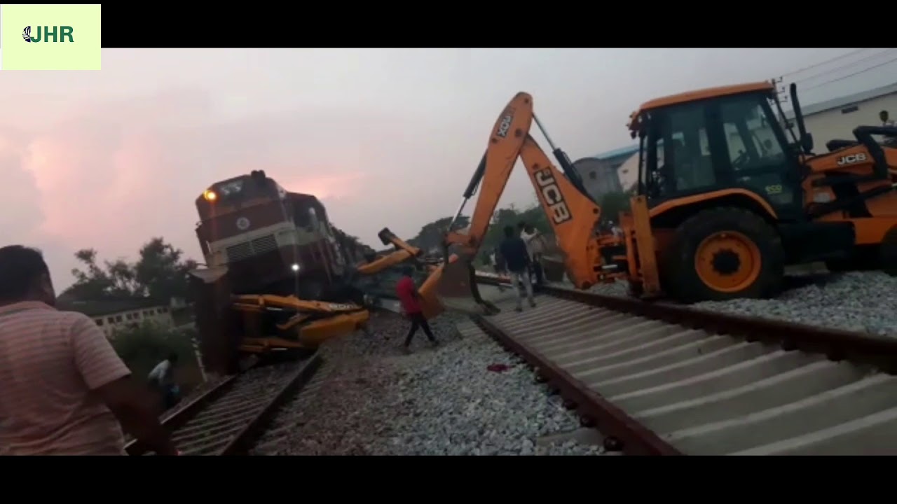 TRAIN AND JCB BACKHOE LOADER ACCIDENT - YouTube