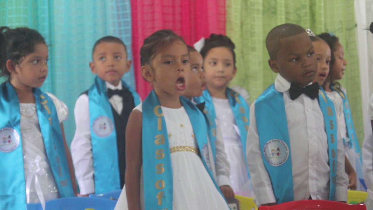 Khailee and friends sing the Belize National Anthem and recite the ...
