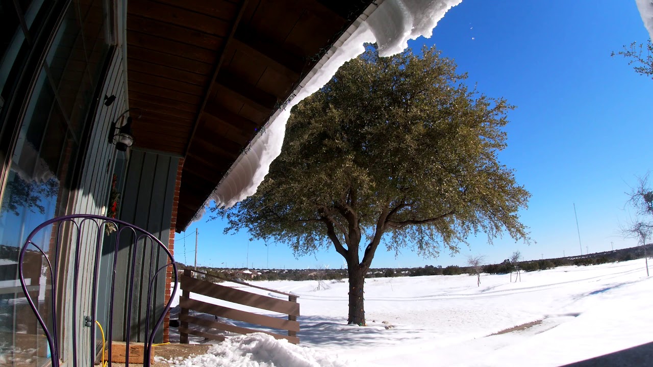 Melting Snow falling/sliding off roof - YouTube