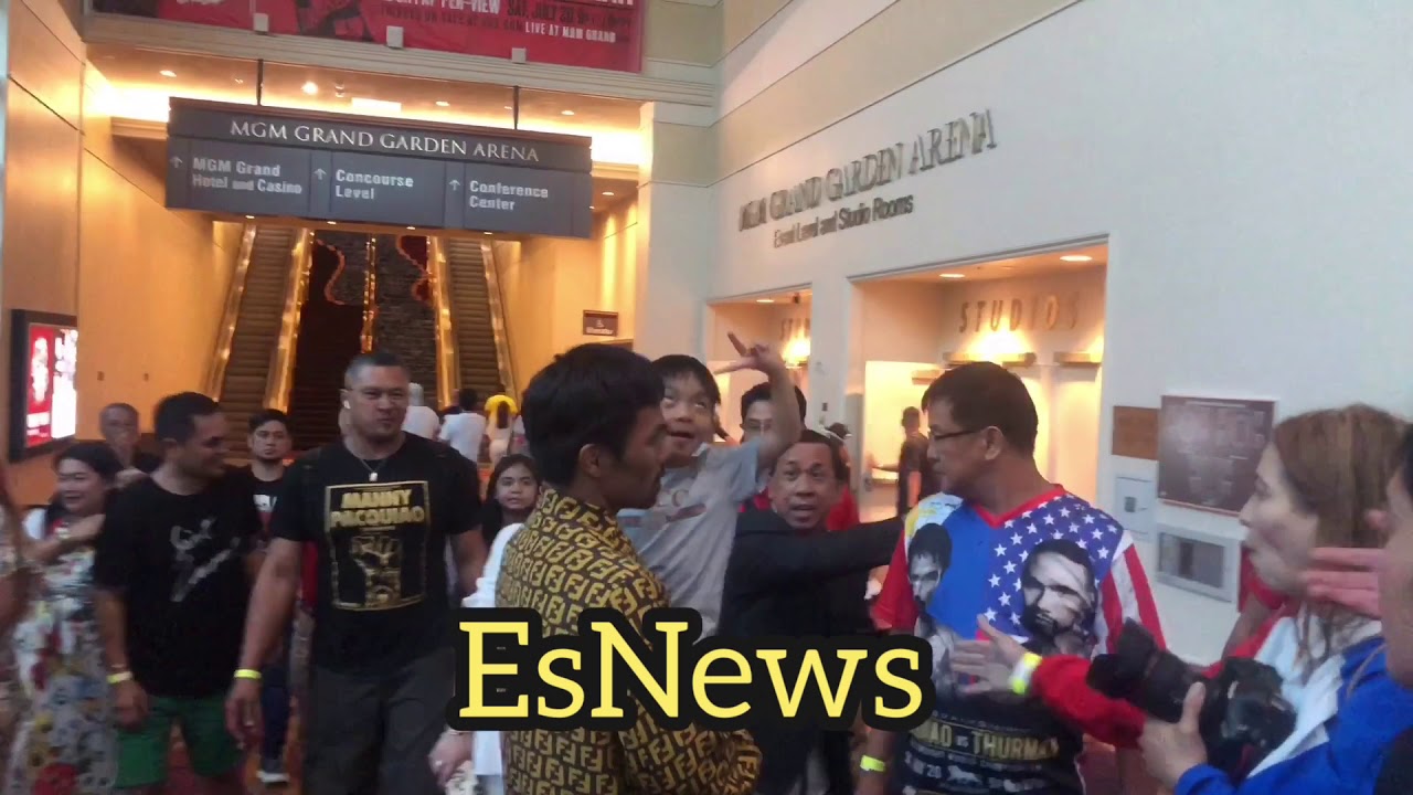 Pacquiao holding his son Israel leaving bible study late night Vegas ...