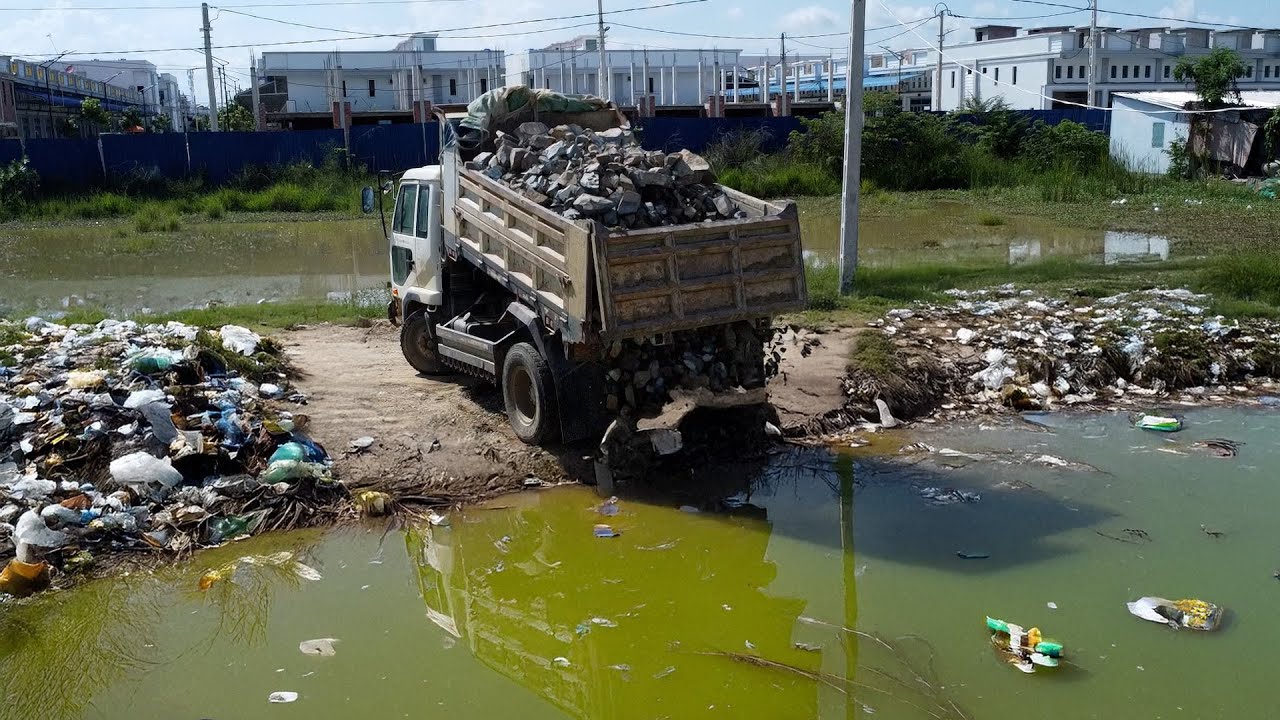 Bulldozer 5T Cleaning Up Near Toxic Sludge Pit - YouTube