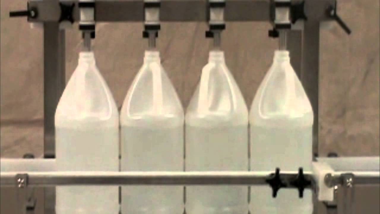 Benchtop Time Gravity Filling Machine Demonstration - YouTube