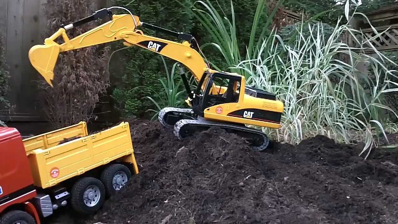 Bruder excavator conversion with readily available hobby par - YouTube