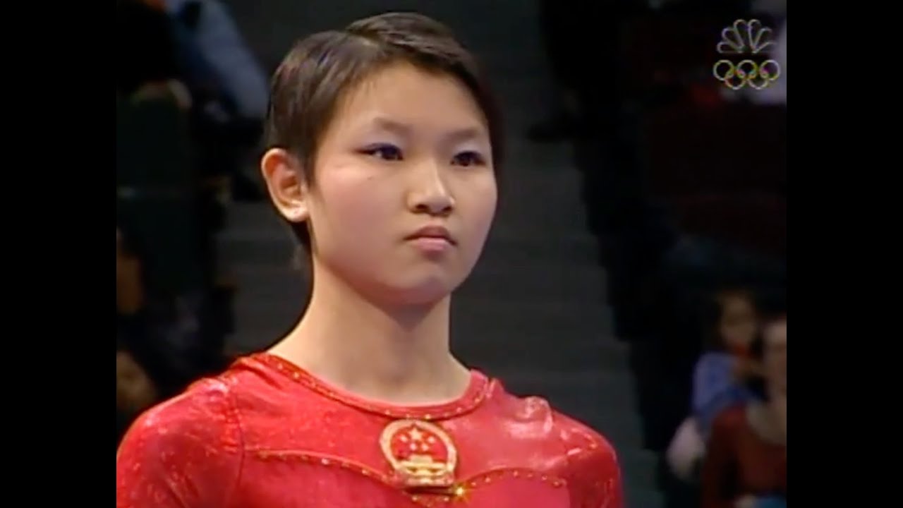 LIU JUAN UNEVEN BARS 2005 AMERICAN CUP - YouTube